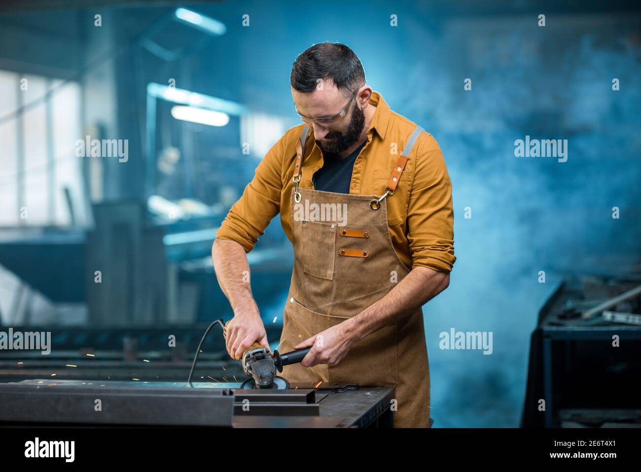 Metal industry worker at factory Stock Photo - Alamy