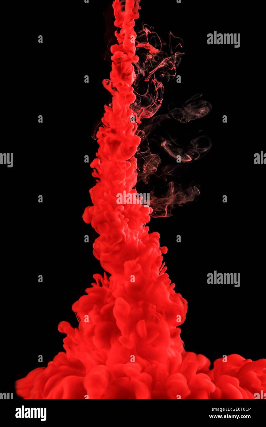 Red abstract background. Ink splashes in water on black Stock Photo - Alamy
