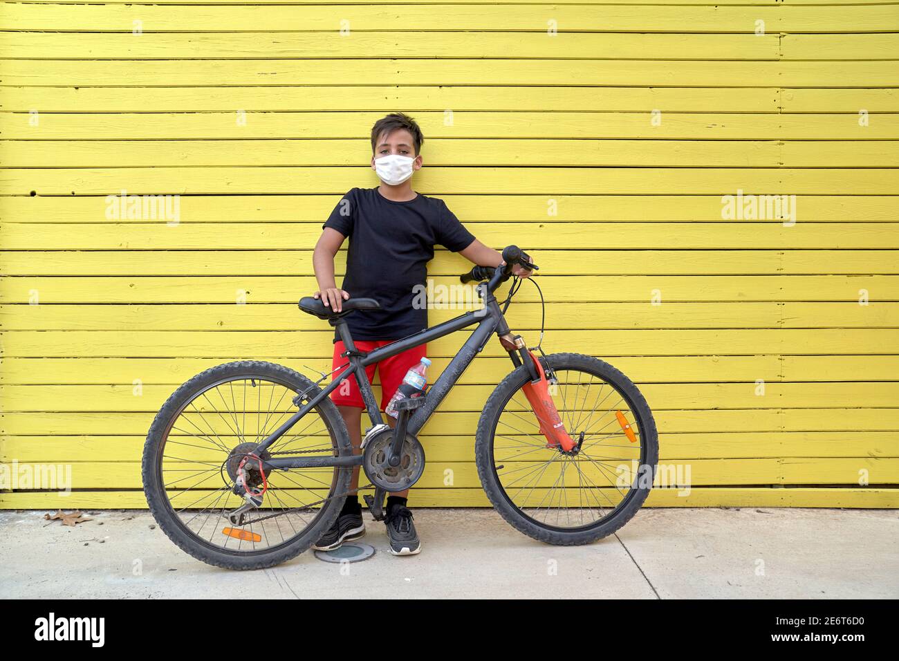 Child driving bicycle hi-res stock photography and images - Alamy
