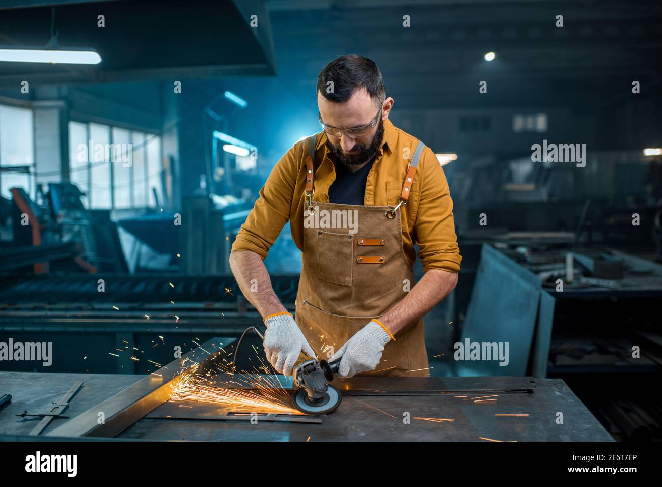 Metal industry worker at factory Stock Photo - Alamy