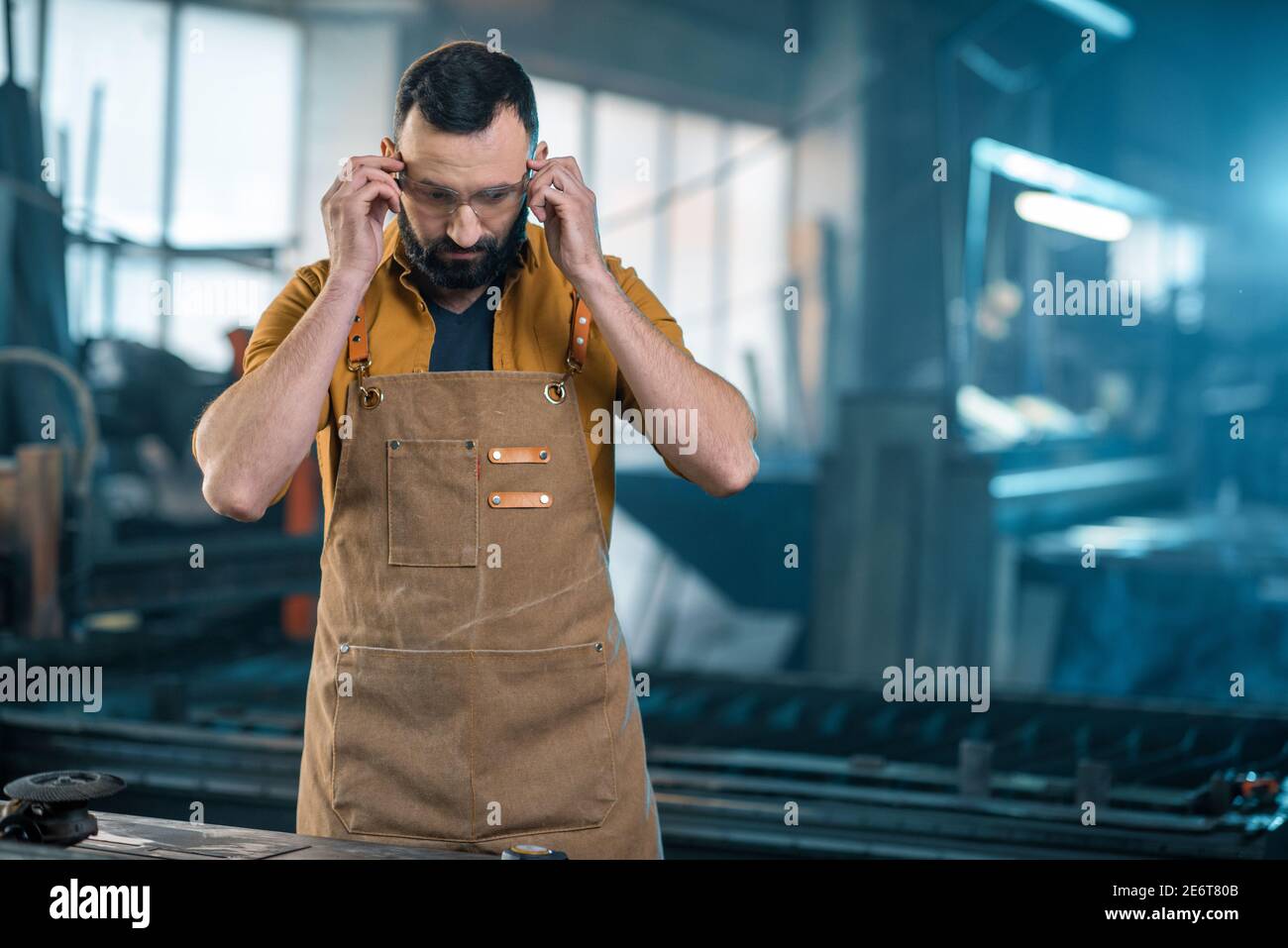 Metal industry worker at factory Stock Photo - Alamy