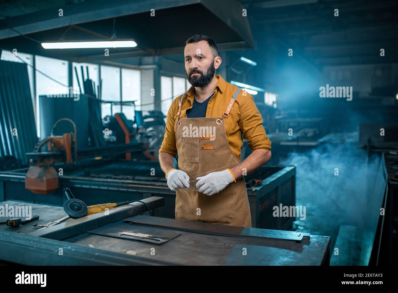 Metal industry worker at factory Stock Photo - Alamy