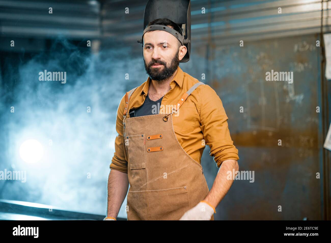 Welder portrait at the workshop Stock Photo - Alamy