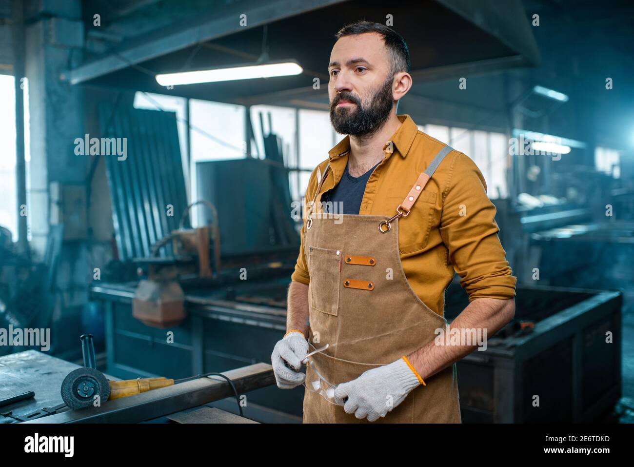 Metal industry worker at factory Stock Photo - Alamy