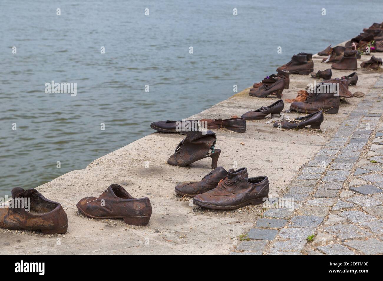 Shoes symbolizing the massacre of people shot at the river Danube ...