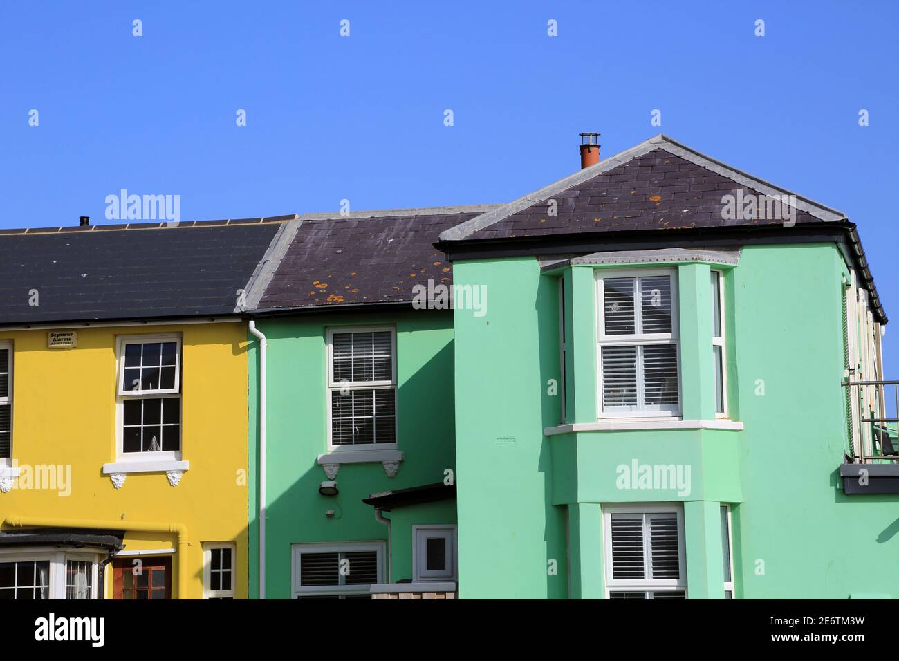 Green and yellow painted houses on Granville Road, Sandgate, Folkestone ...