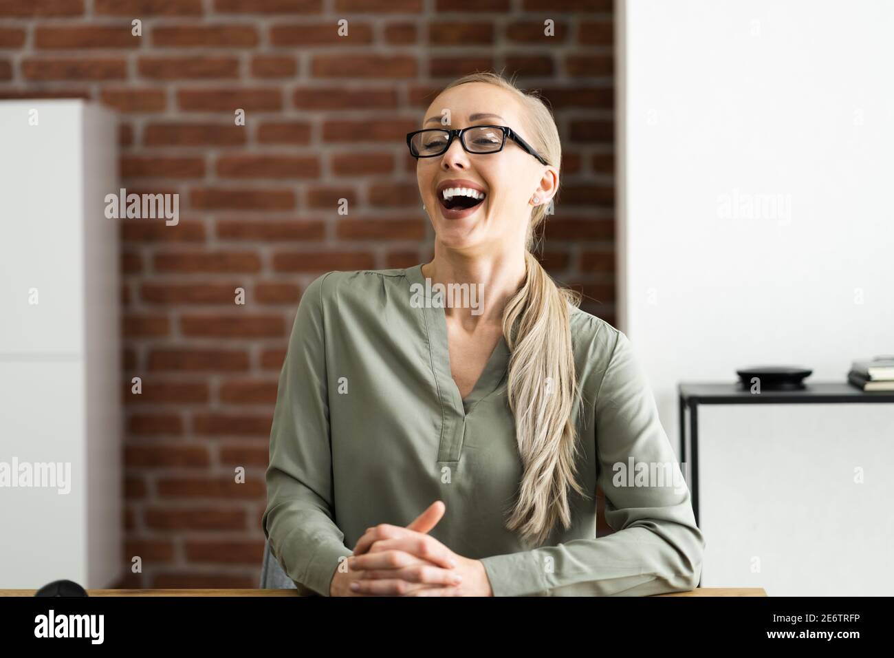 Excited Woman Face At Home Mouth Open Stock Photo - Alamy
