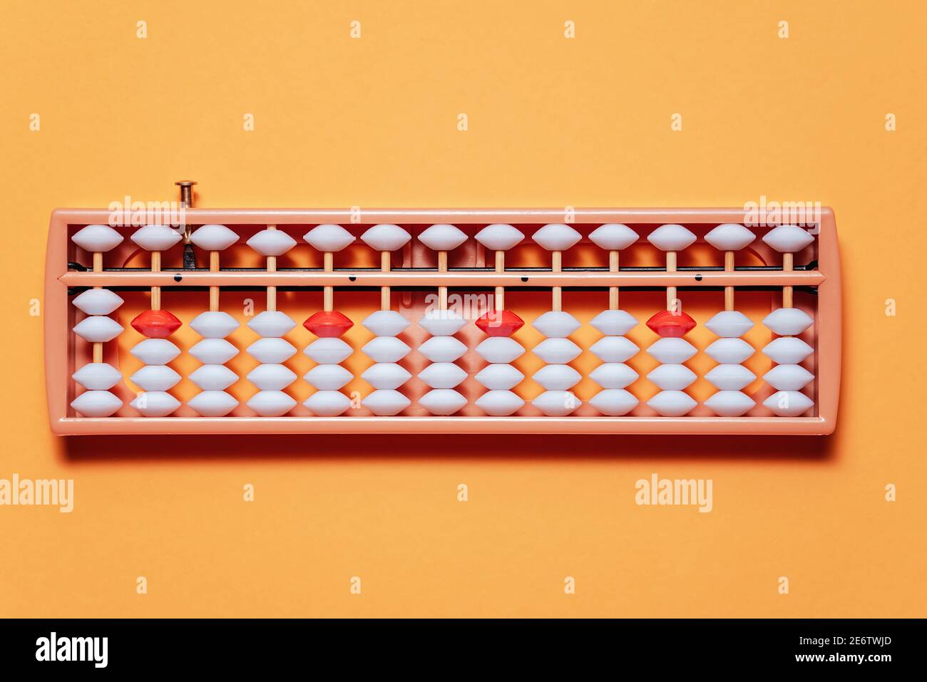 Japanese traditional abacus soroban on orange background. Education and ...