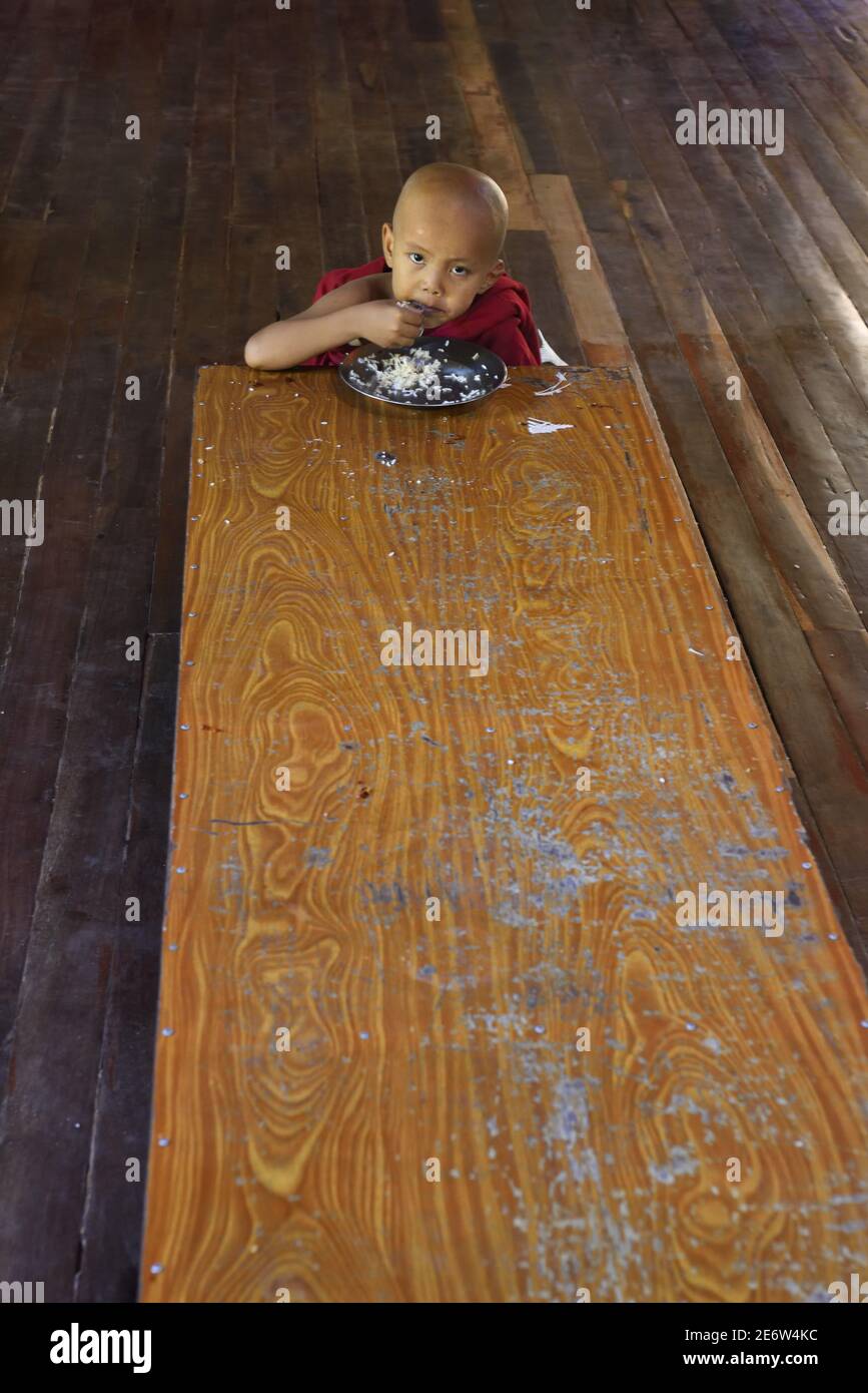 Myanmar (Burma), Bagan, Shwe Gu monastery, Novices lunch Stock Photo ...