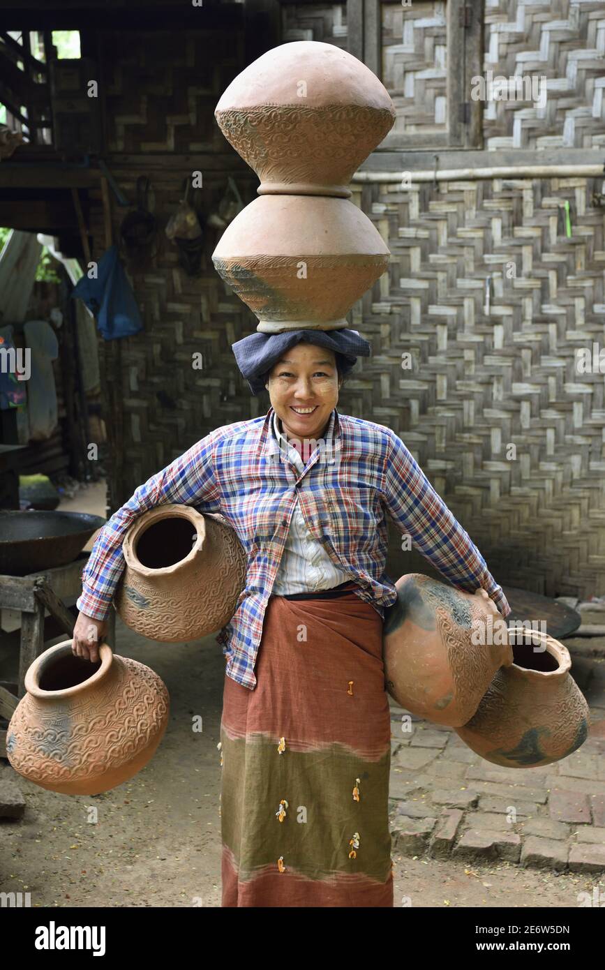 Myanmar (Burma), Mingun surroundings, Shwebo pottery village, Potter at ...
