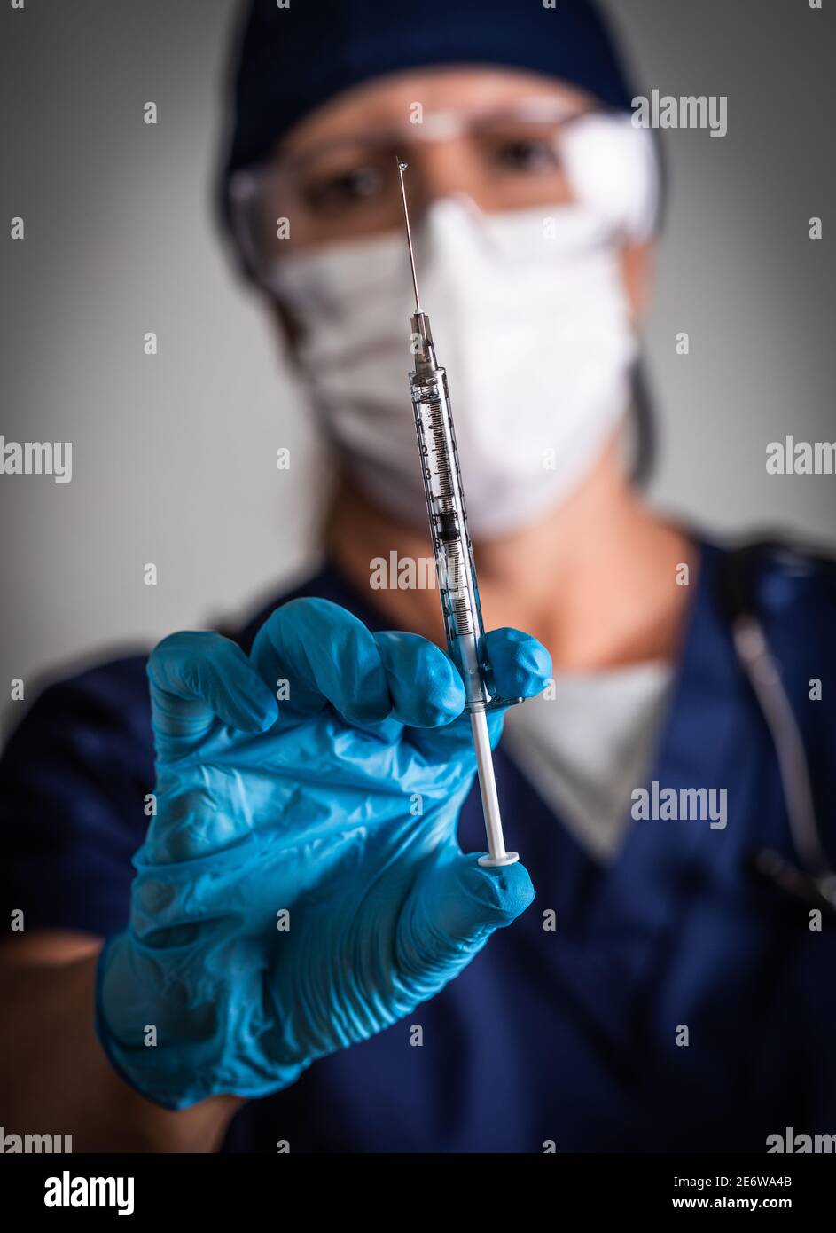 Doctor or Nurse Holding Medical Syringe with Needle Stock Photo - Alamy