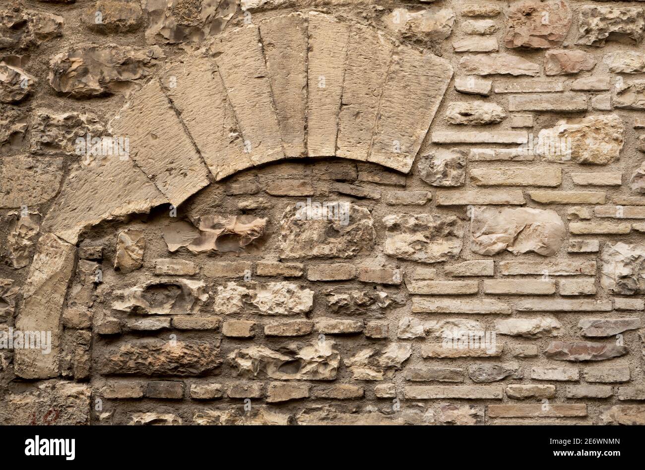 Ancient wall with half arch repaired after a major earthquake in Asissi ...