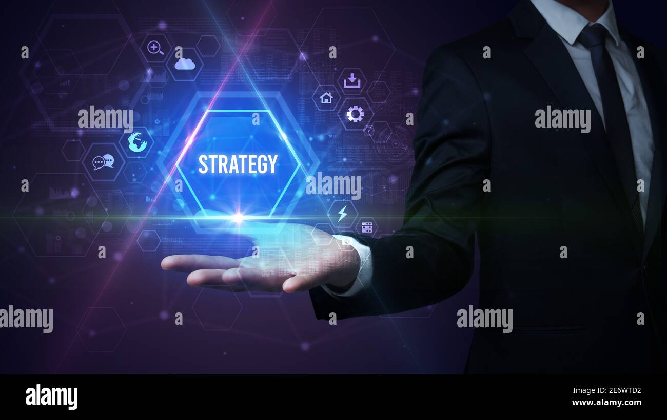 Man hand holding STRATEGY inscription, social media concept Stock Photo ...