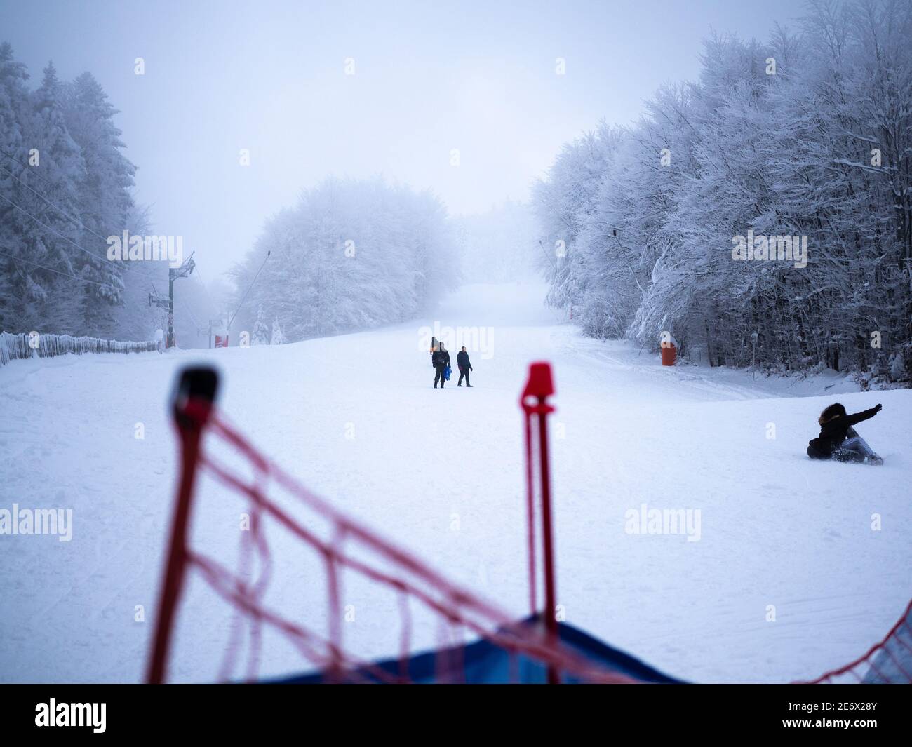 People sledging on slope hi-res stock photography and images - Alamy