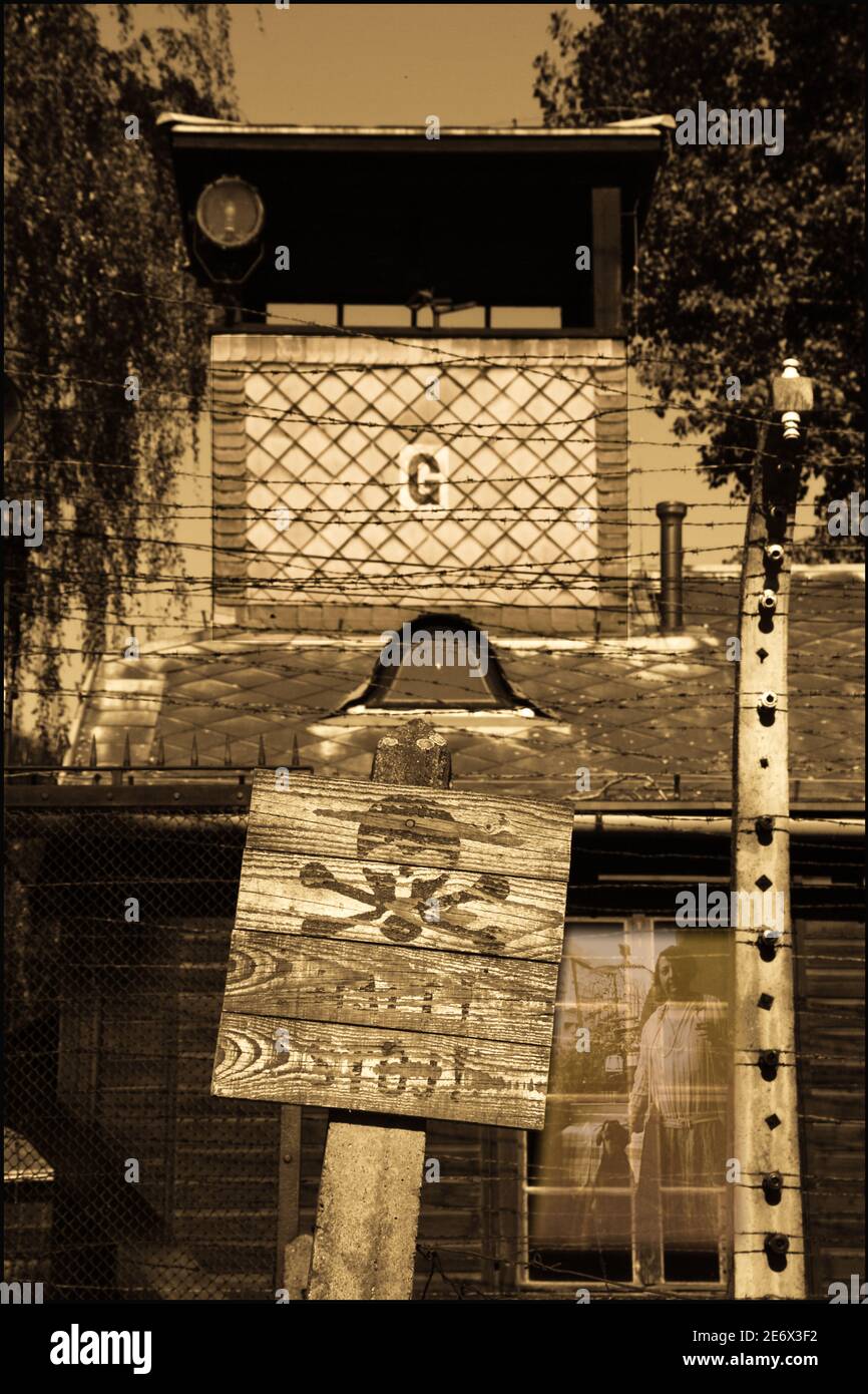 Guard tower and electric fence at Auschwitz II-Birkenau Stock Photo - Alamy