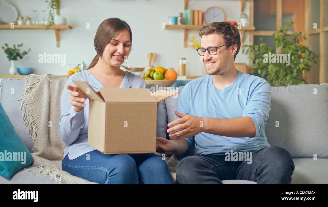 The Family Satisfied By a Quick Delivery. Unpacking of Order From ...