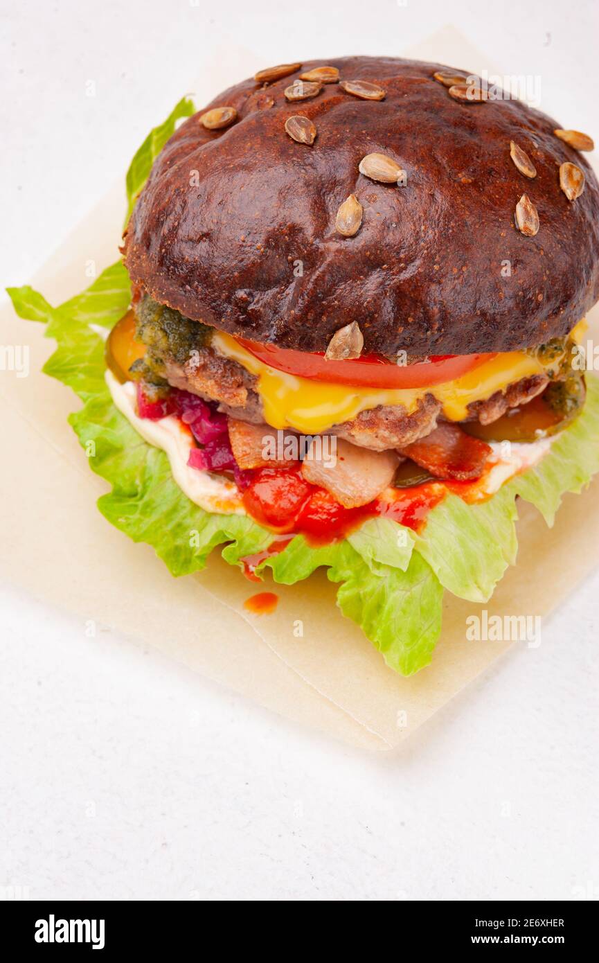 rye bun hamburger on the white background Stock Photo - Alamy
