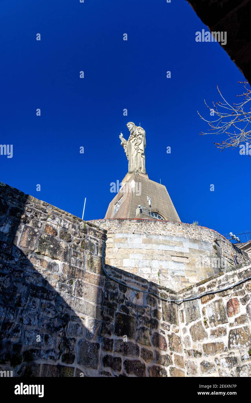 Jesus on Mount Urgull with a beautiful blue sky in San Sebastian, Spain ...