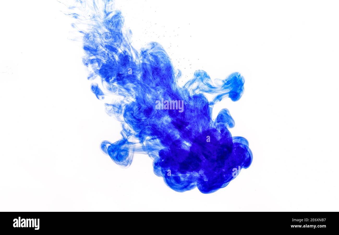 Blue ink injected into water from syringe, colour mixing with water ...