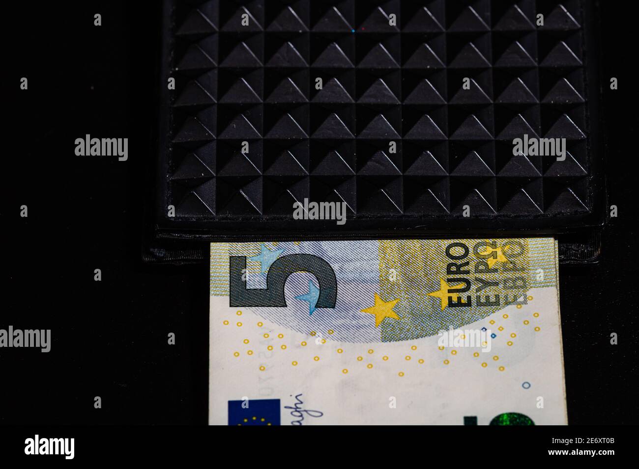 5 Euro money banknotes in black wallet isolated Stock Photo - Alamy