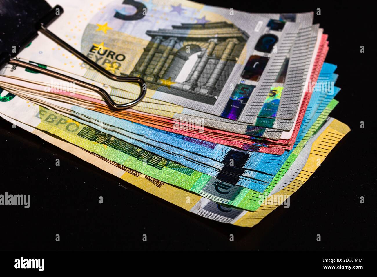 Close up on stack of EURO money. Euro banknotes isolated Stock Photo ...