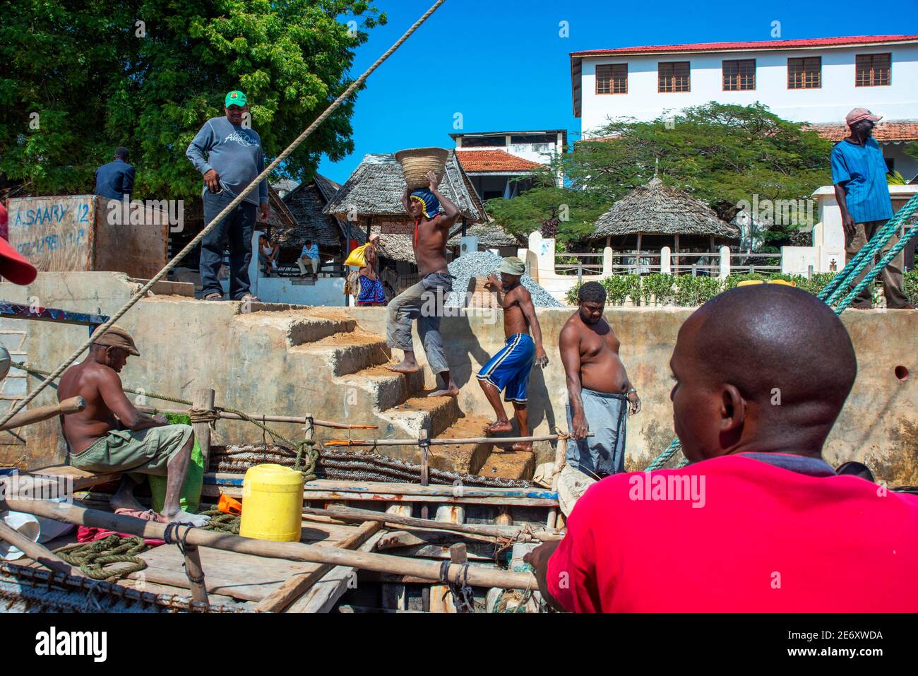 January 2020 - Unloading construction materials from a ship in the Lamu ...