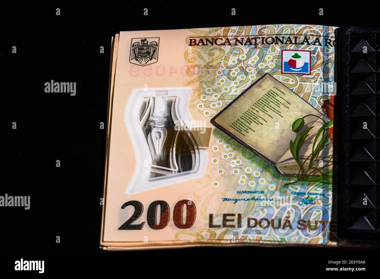 LEI romanian money banknotes in black wallet isolated Stock Photo - Alamy