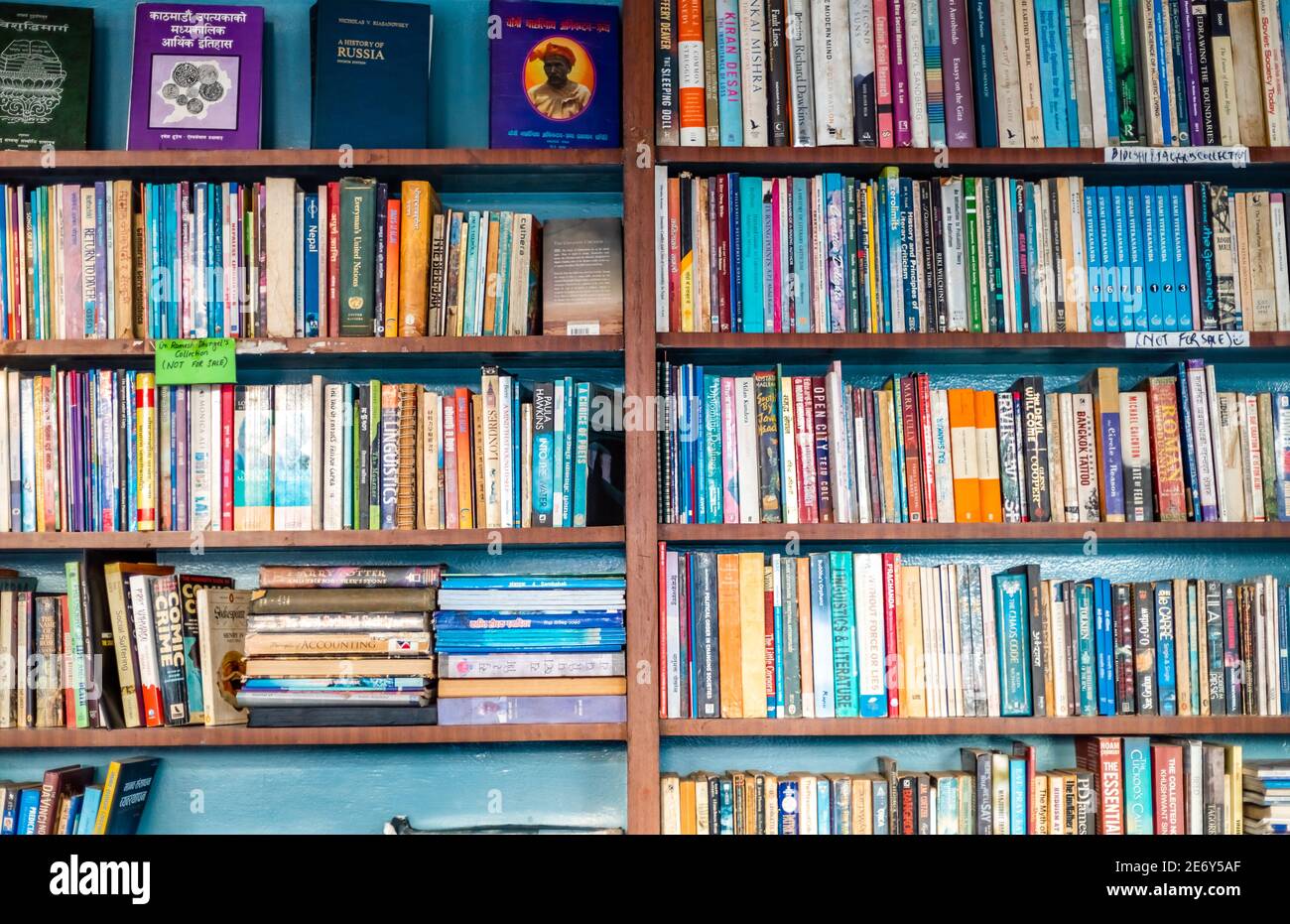 Kathmandu, Nepal - January 24 2021: Books placed on a bookshelf at a ...