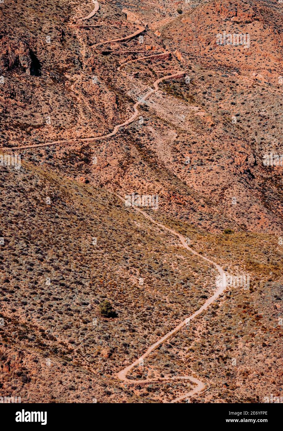 Vertical shot of a path leading mountain Stock Photo - Alamy