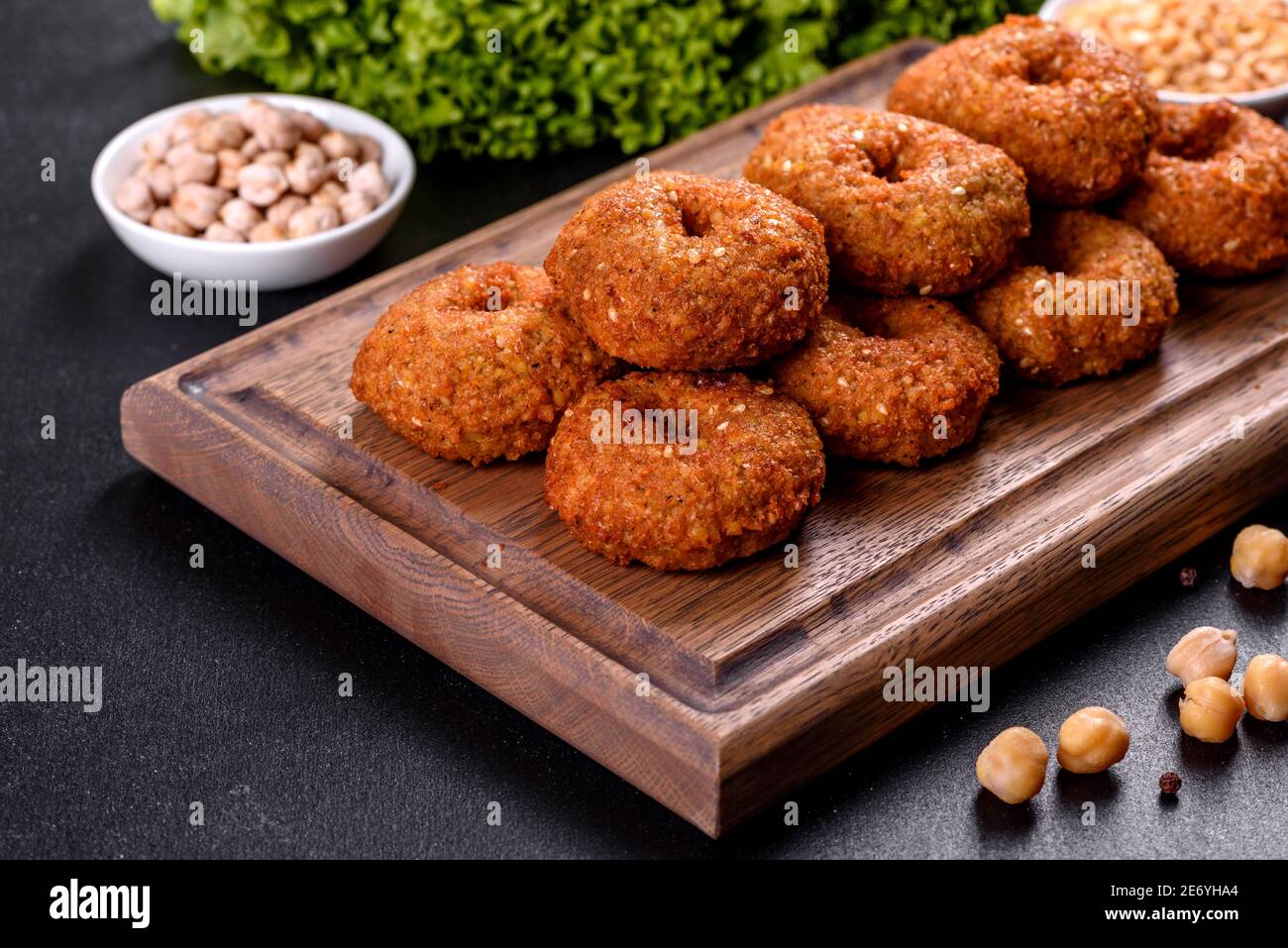 Beautiful delicious fresh chickpea falafel with sauces on a concrete ...
