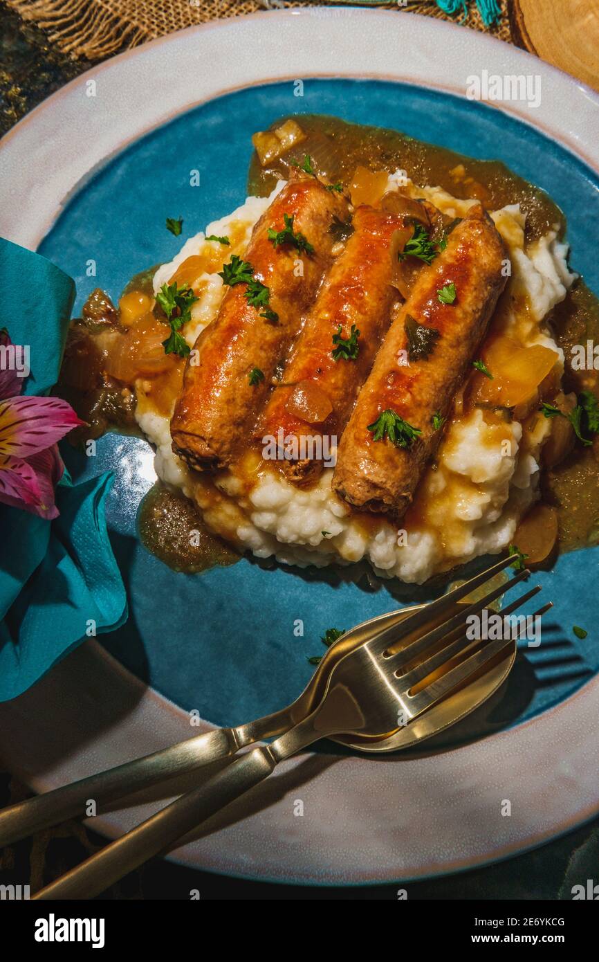 British bangers and mash sausage and mashed potatoes with onion gravy ...