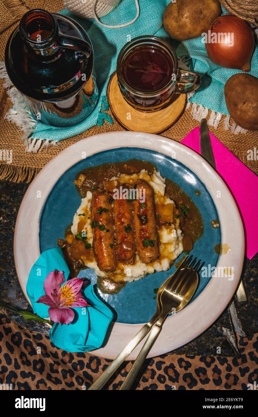 British bangers and mash sausage and mashed potatoes with onion gravy ...