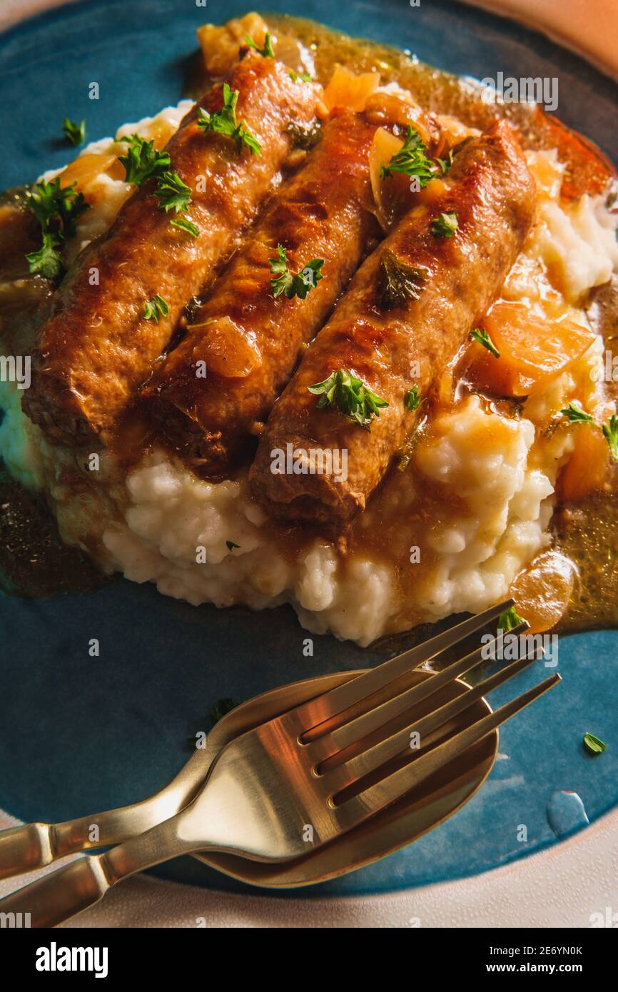 British bangers and mash sausage and mashed potatoes with onion gravy ...