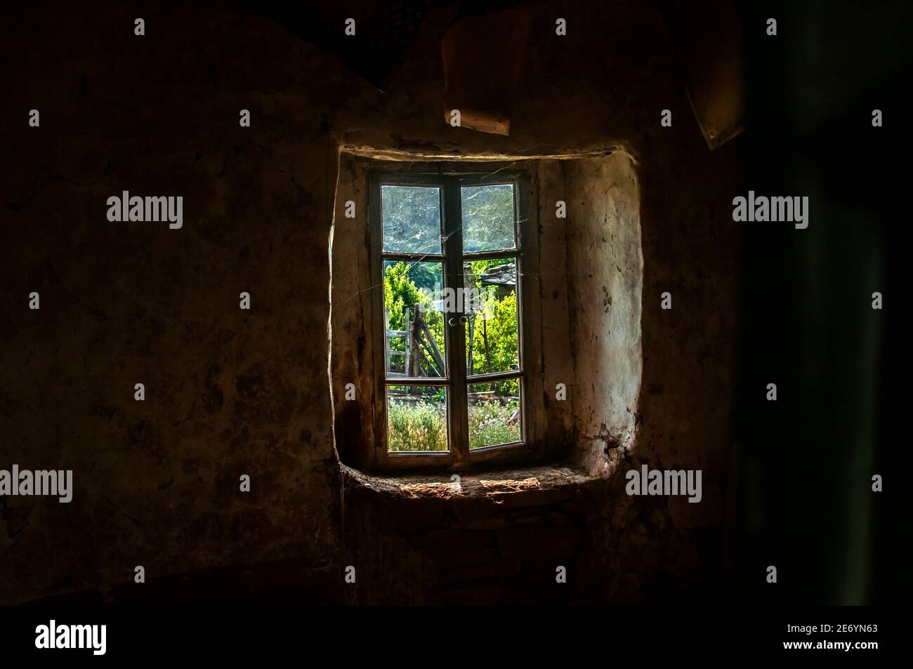 Wooden window of old abandoned neglected country house with view from ...