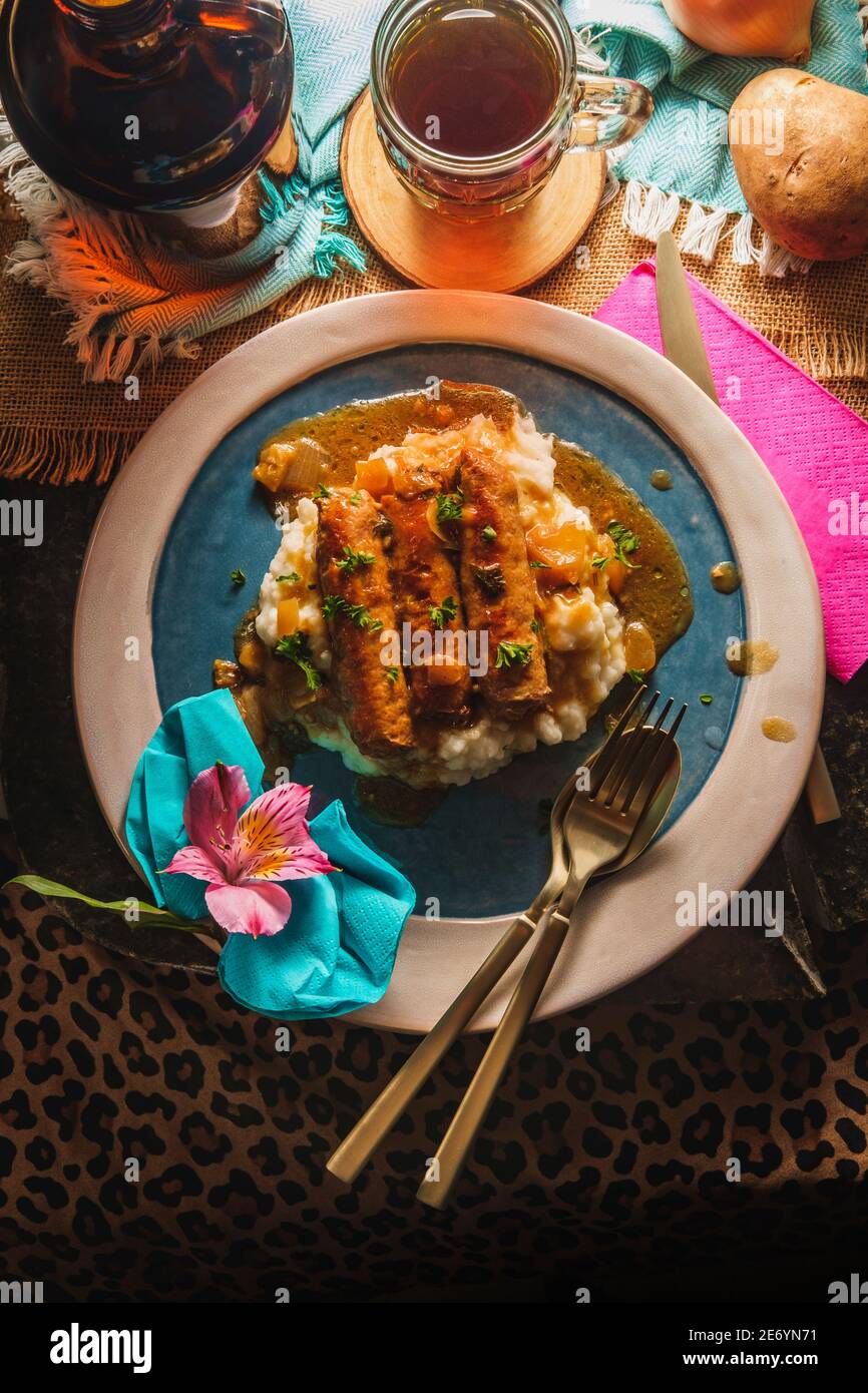 British bangers and mash sausage and mashed potatoes with onion gravy ...