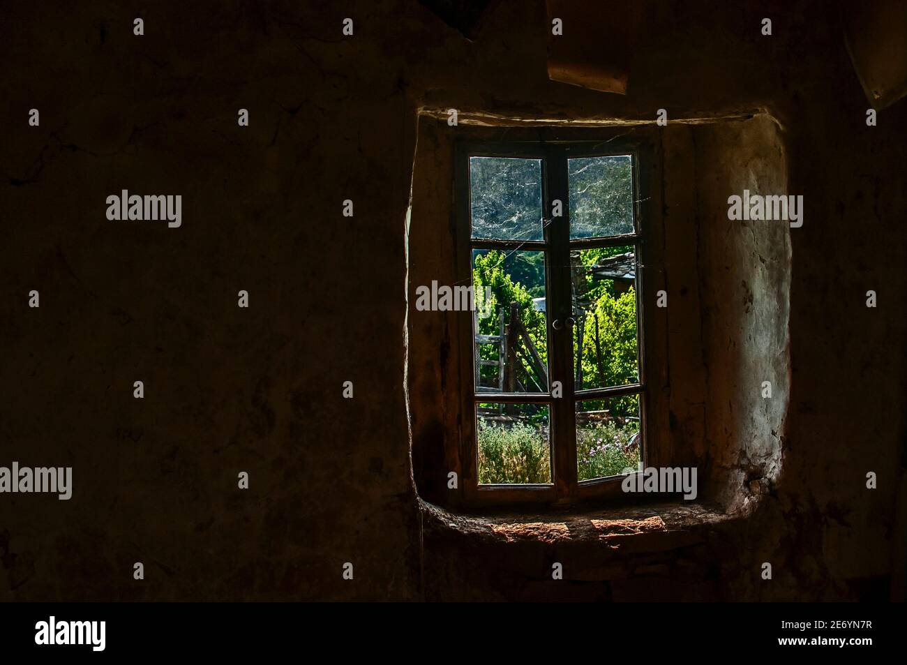Wooden window of old abandoned neglected country house with view from ...