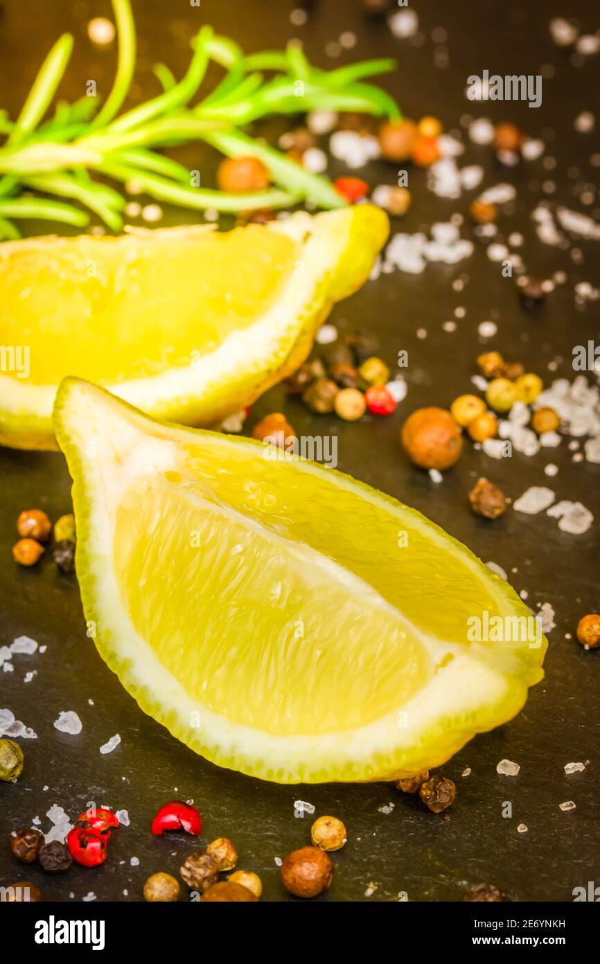 sliced lemon with mix of spices Stock Photo - Alamy