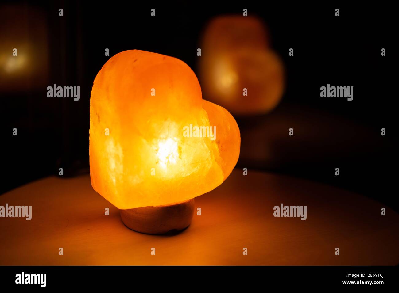 Light in heart shape on small table Stock Photo - Alamy