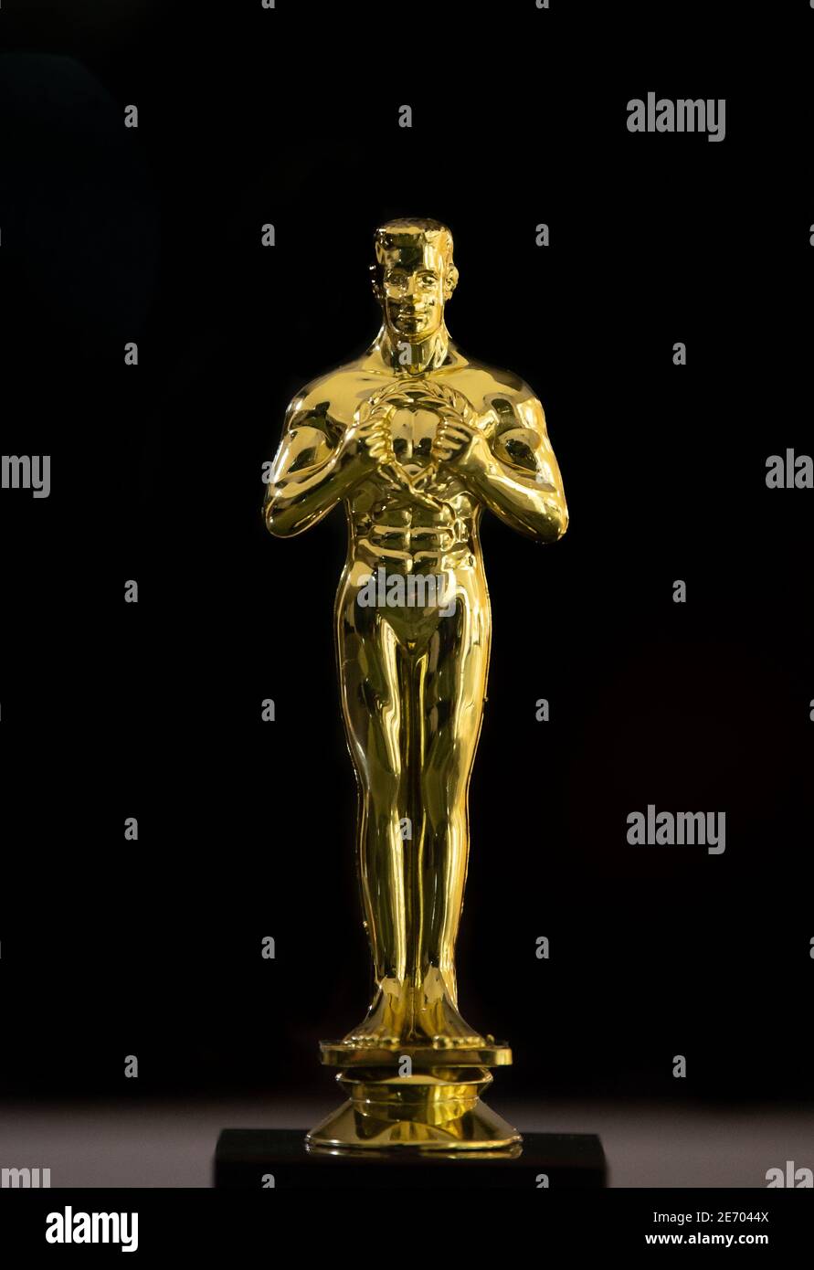 A golden Oscar replica trophy Stock Photo - Alamy