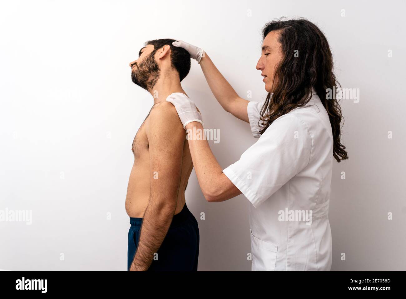 Stock photo of man receiving massage by physiotherapist professional ...