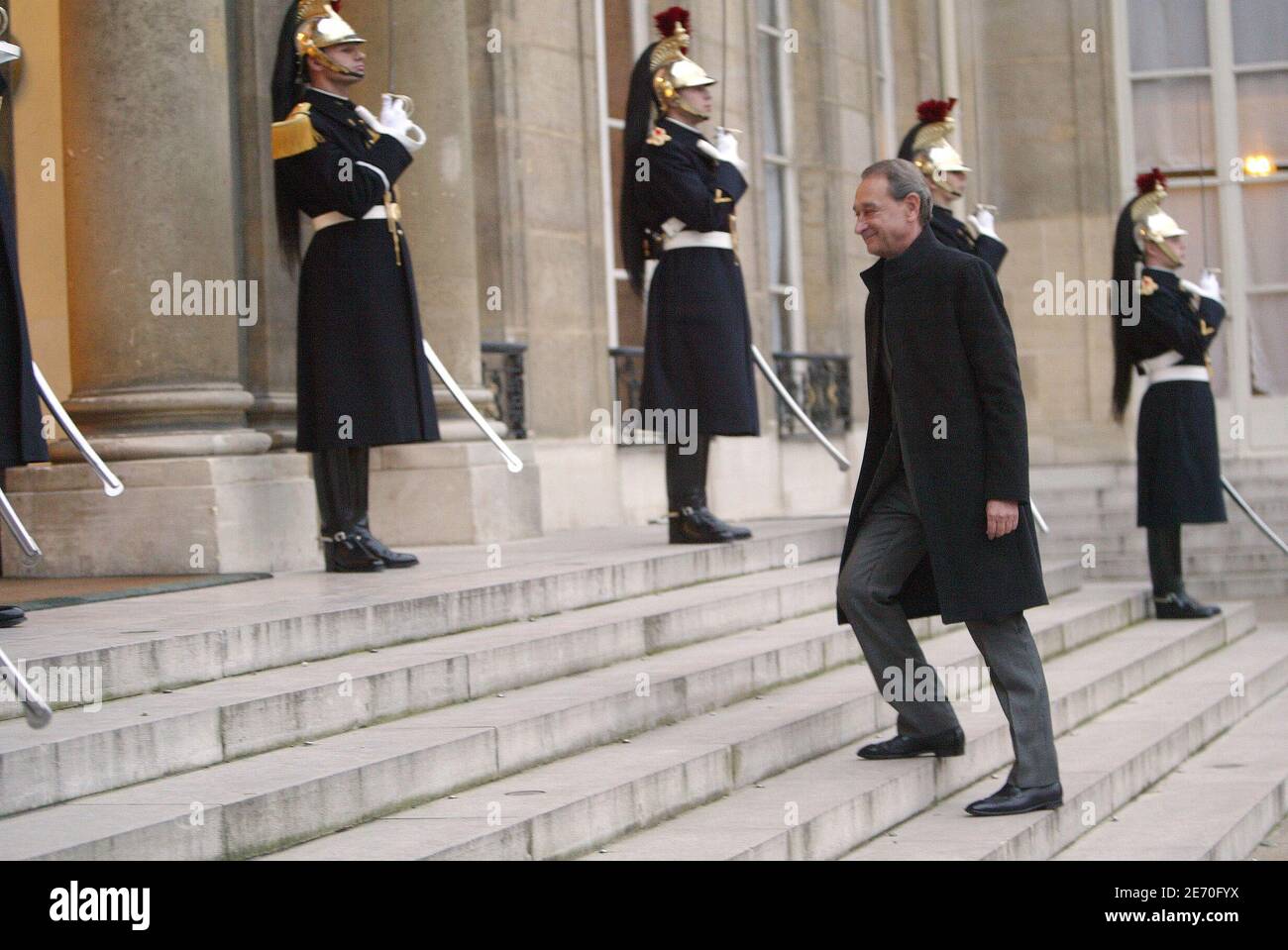 Paris Mayor Bertrand Delanoe arrives at the Elysee Palace to present ...