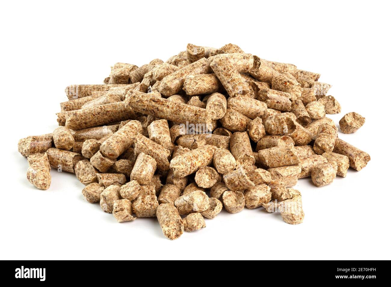 Small pile of pressed wooden dry sawdust pellets isolated on white ...
