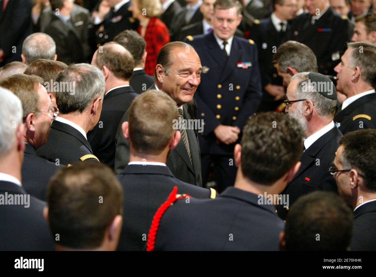 President Jacques Chirac greets Armies's members after he delivered his ...