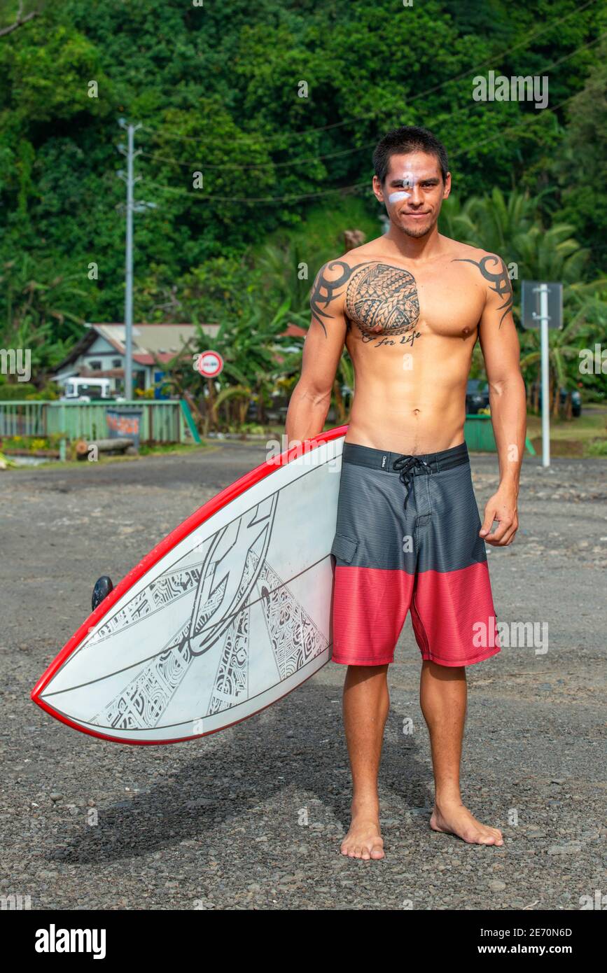 February 2020 - Surfer at Beach with black sand on Pointe Venus, Tahiti ...