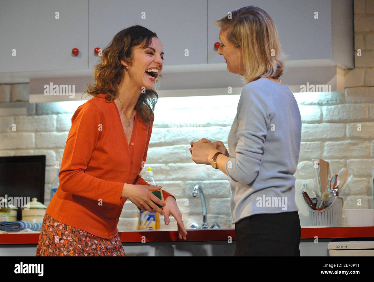 French actresses Lysiane Meis (L) and Anne Loiret perform in Christine ...