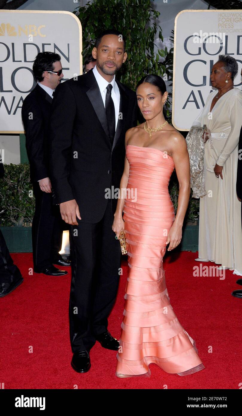 Will Smith and his wife Jada Pinkett Smith pose on the red carpet of ...