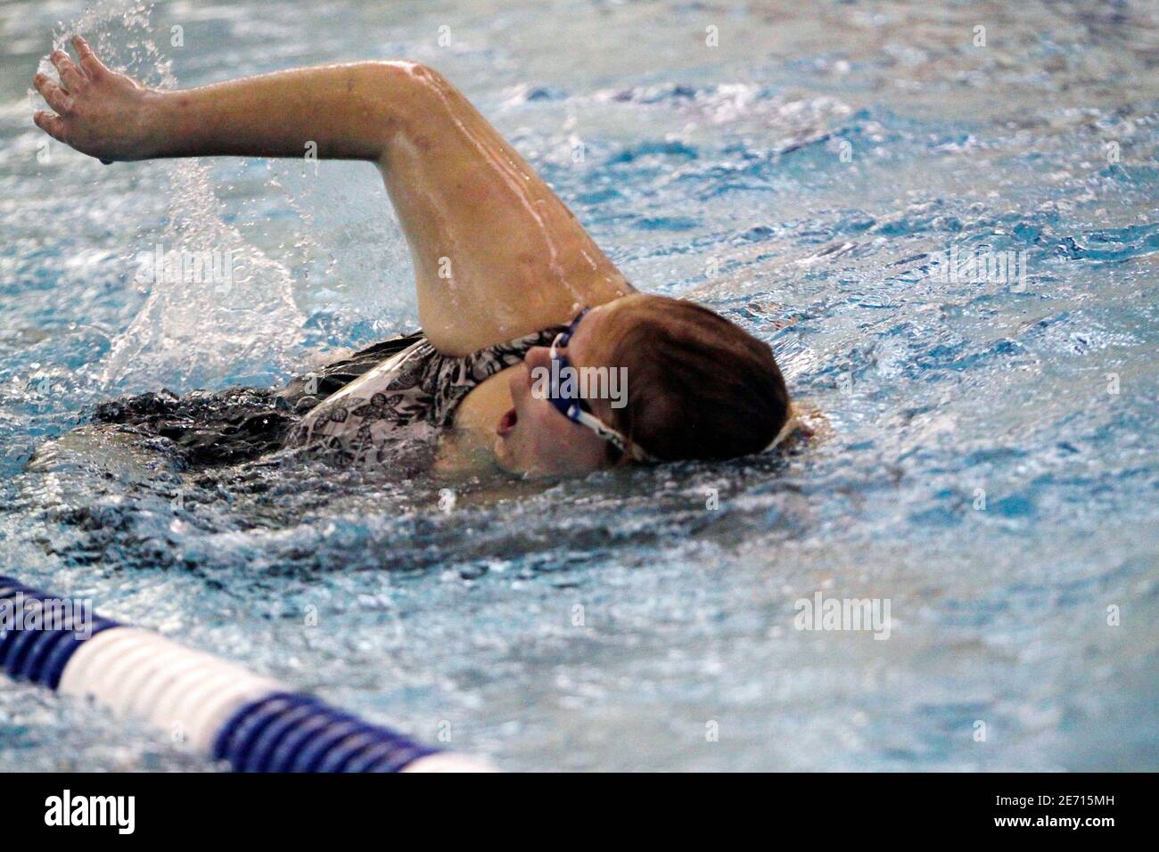Woman swimming laps in a pool hi-res stock photography and images - Alamy