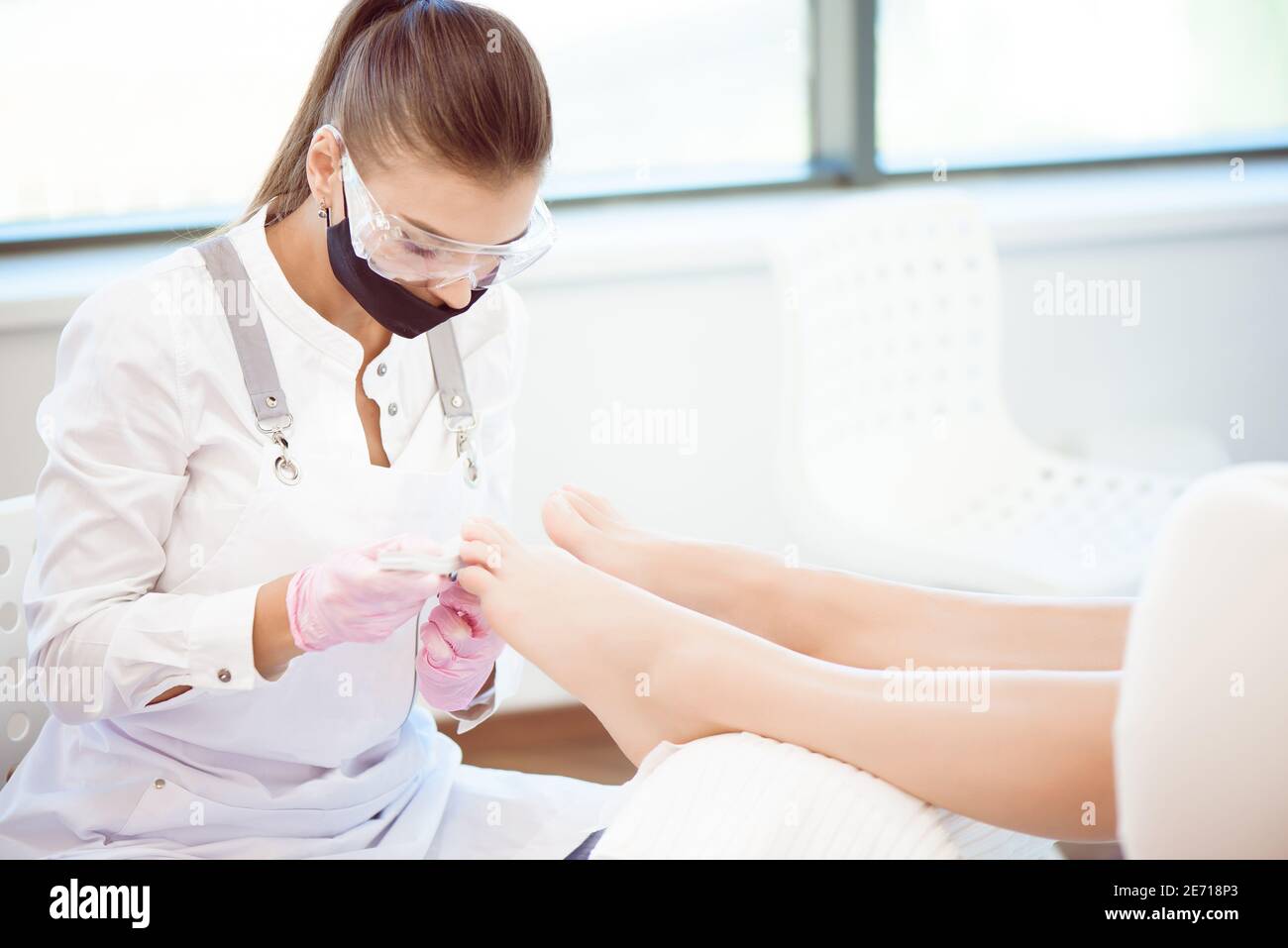 Woman receiving pedicure procedure hi-res stock photography and images ...
