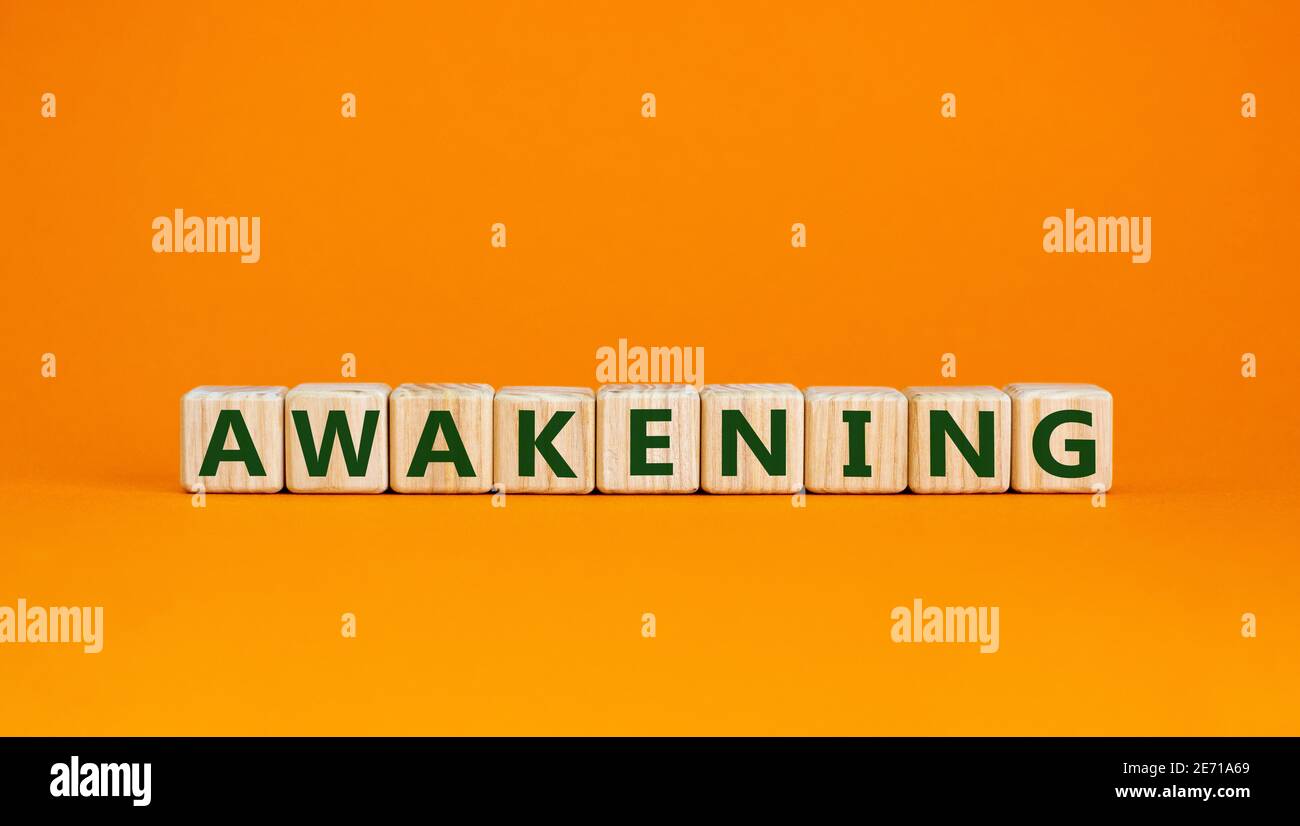 Awakening symbol. Wooden cubes with the word 'awakening'. Beautiful ...