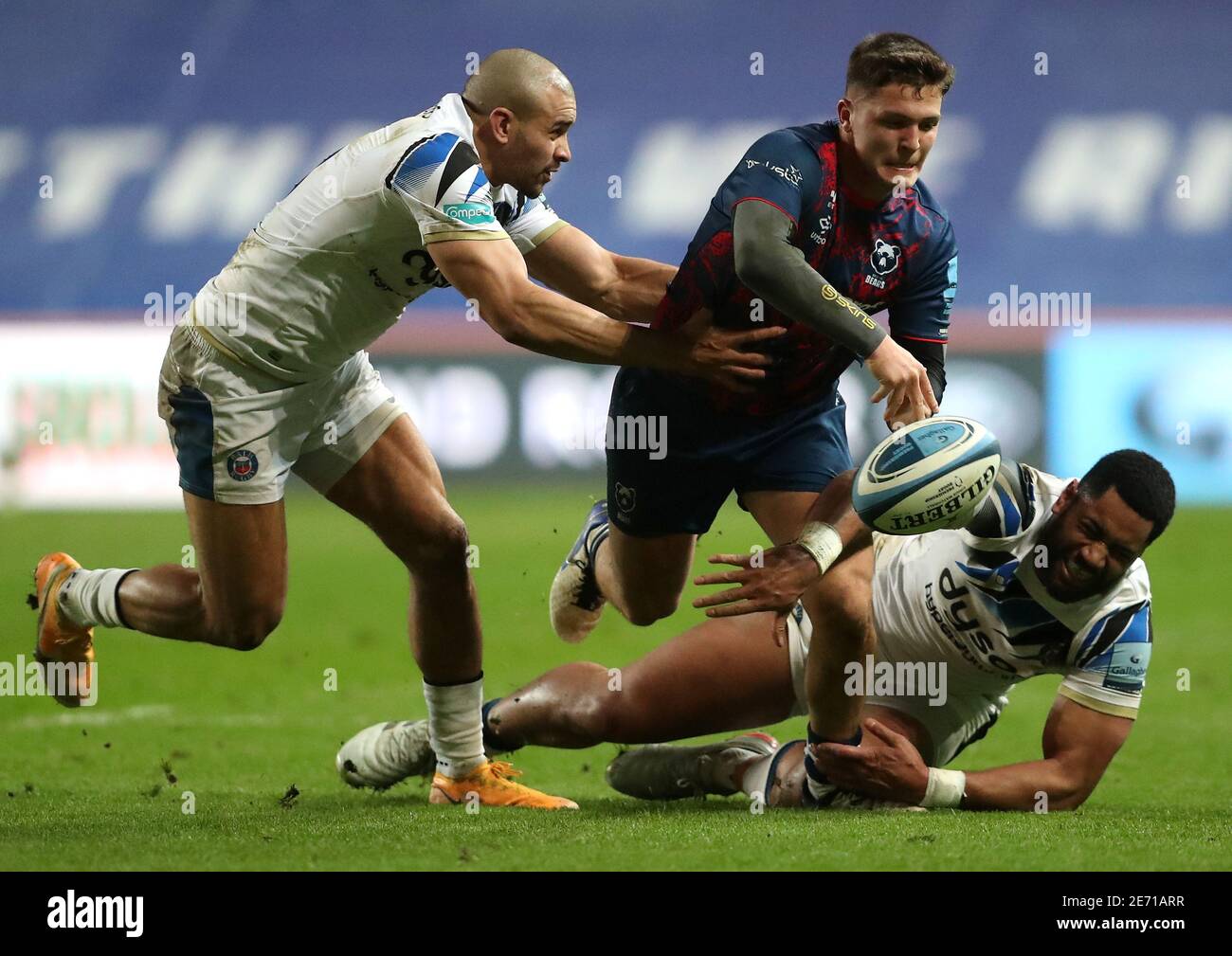 Bristol's Callum Sheedy (centre) is tackled Bath's Jonathan Joseph and ...